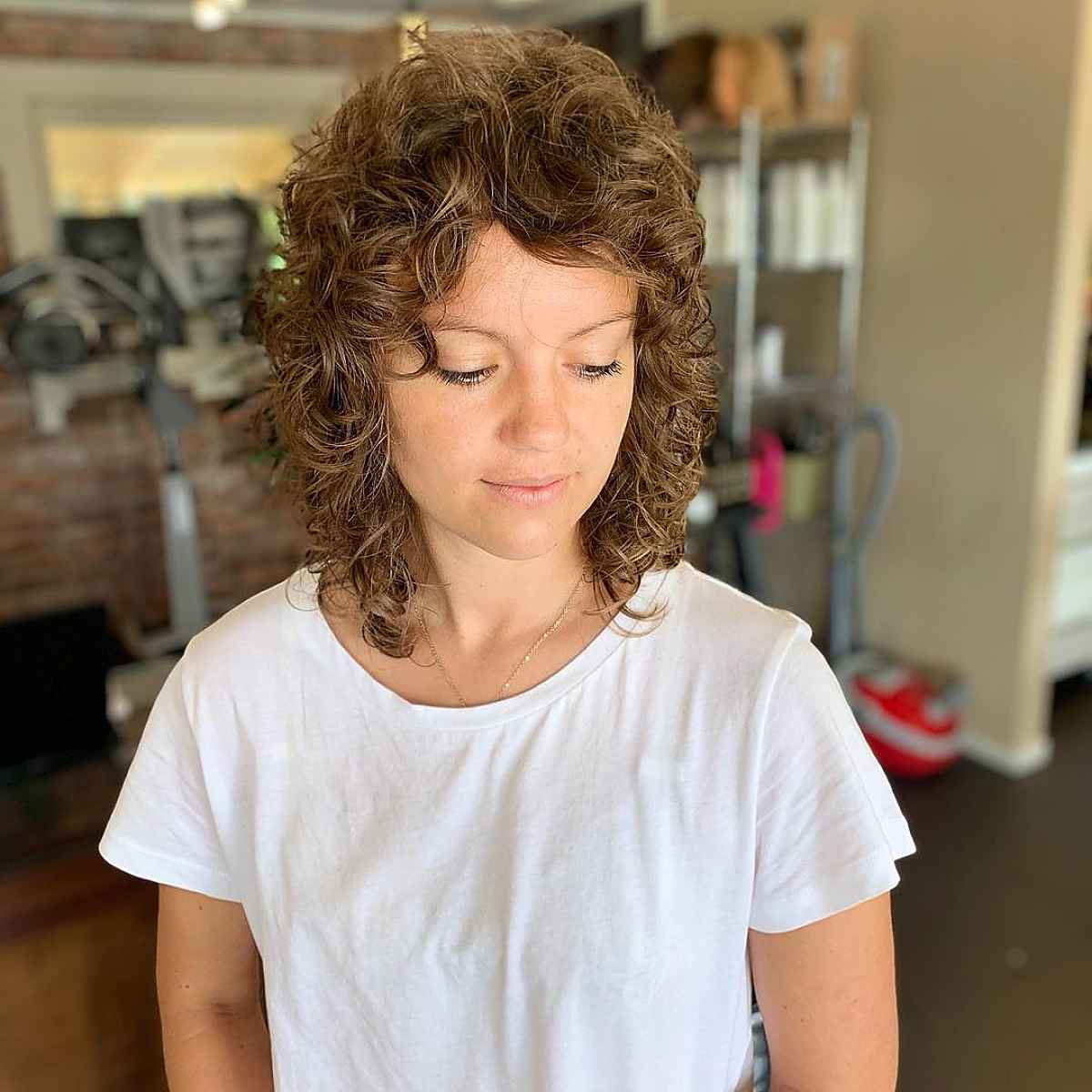 25+ Modern Curly Mullet Hairstyles for Girls in 2025 - Taper Fade