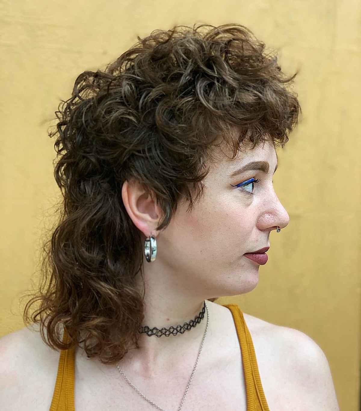 25+ Modern Curly Mullet Hairstyles for Girls in 2025 - Taper Fade